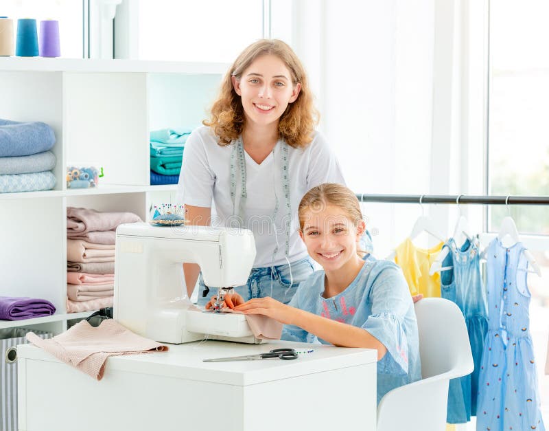 Tailor is teaching student stock photo. Image of cloth - 174038530