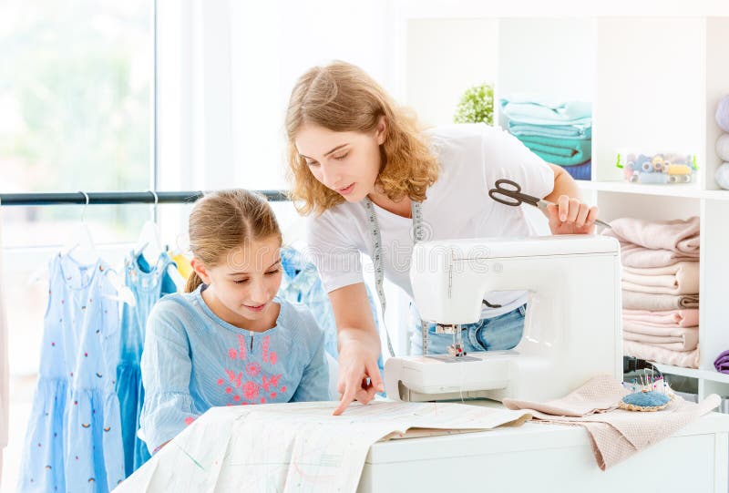 Tailor is teaching student stock photo. Image of machine - 174038516