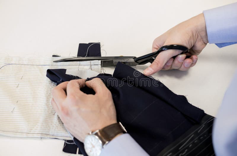 Tailor using scissors stock image. Image of handmade - 345066889