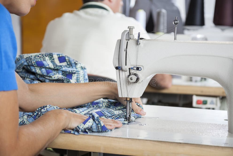 Tailor Using Sewing Machine at Workbench Stock Image - Image of ...