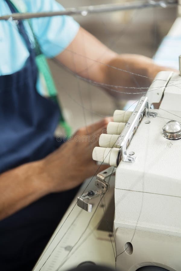 Tailor Using Sewing Machine at Workbench Stock Image - Image of ...