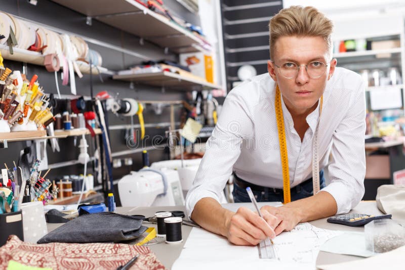 Tailor Using Tape Measure for Creating Pattern Stock Photo - Image of ...