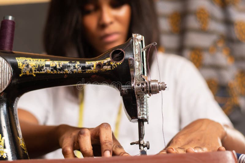 Tailor Working in Her Shop with a Sewing Machine Stock Image - Image of ...