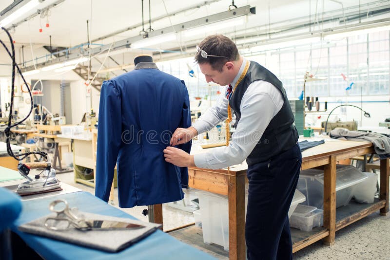Tailor Working on Jacket in Workshop Stock Photo - Image of suit ...
