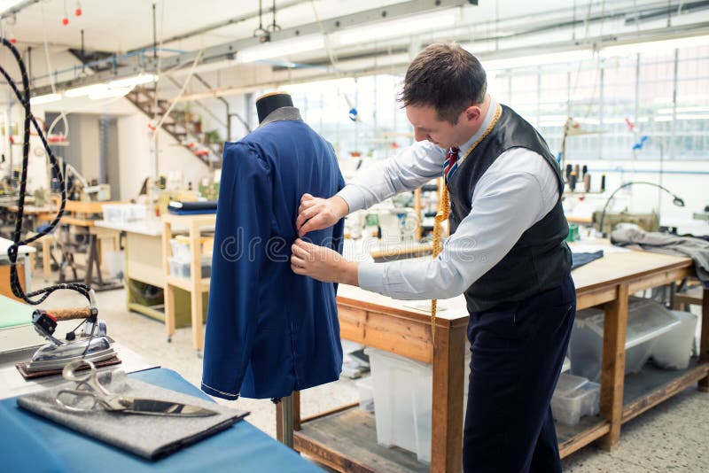 Tailor Working on a Partially Completed Jacket Stock Image - Image of ...
