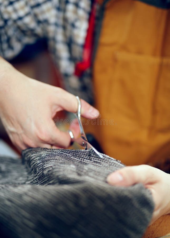 Tailor Working at Studio Cutting Fabric, Detail of Hand with Scissors ...