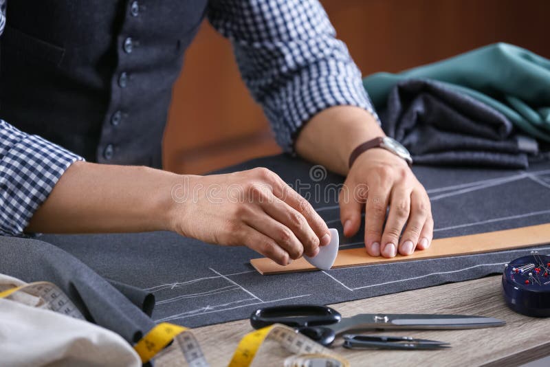 Tailor Working at Table in Atelier Stock Photo - Image of industry ...
