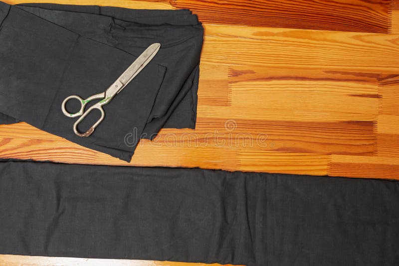 Tailoring Concepts. Cutting Textile Cloth at Work Table with Old Rusty ...