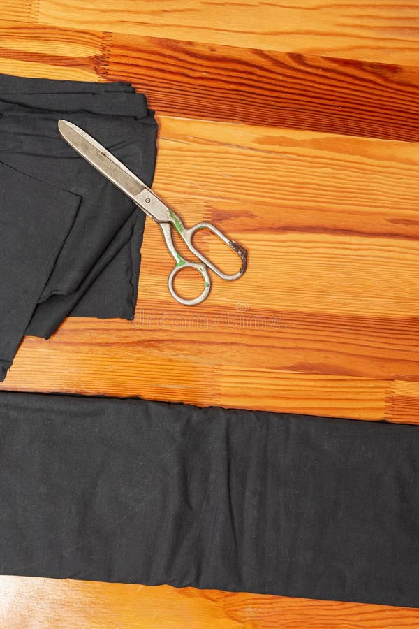 Tailoring Concepts. Cutting Textile Cloth at Work Table with Old Rusty ...