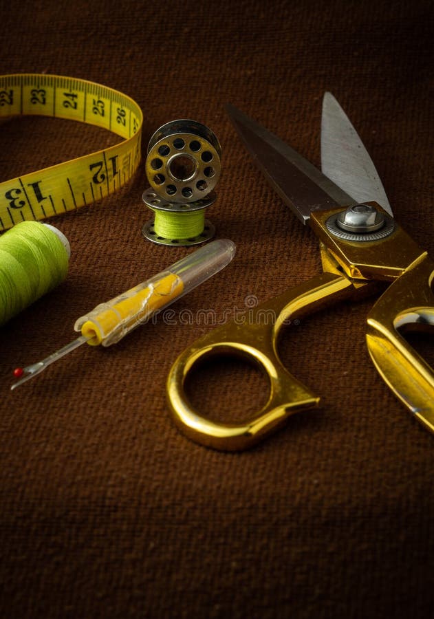 Tailoring Materials on a Brown Background Stock Photo - Image of ...