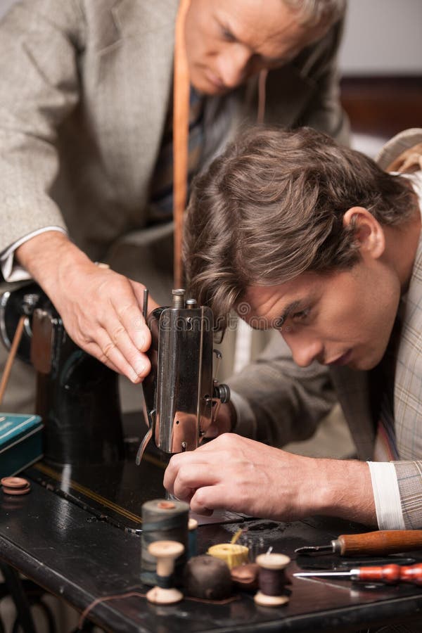 Tailors at work. stock photo. Image of necktie, tool - 33941624