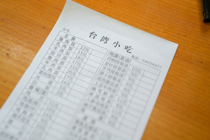 A Taiwanese Restaurant Order Sheet is Placed on a Wooden Table, Showing ...