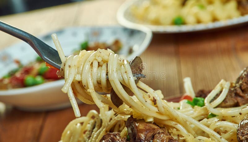 Tajarin with Chicken Liver Sugo Stock Photo - Image of basil, topview ...