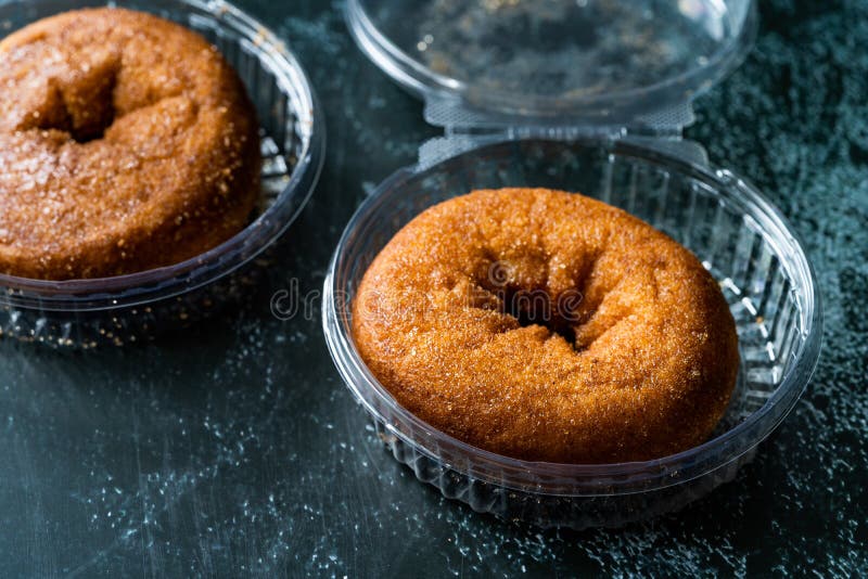 Take Away Donuts with Cinnamon in Plastic Box Package / Container Stock ...