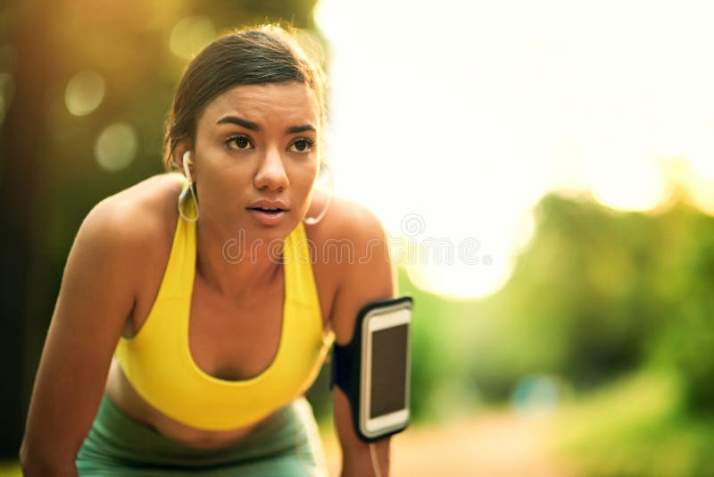 Take a Break and Keep Going. a Sporty Young Woman Outdoors. Stock Photo ...