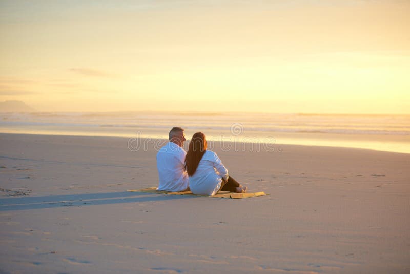 Take a Break...a Mature Couple Relaxing Together on the Beach. Stock ...