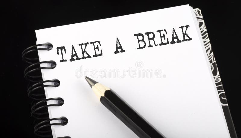 TAKE a BREAK Written Text in Small Notebook on a Black Background Stock ...