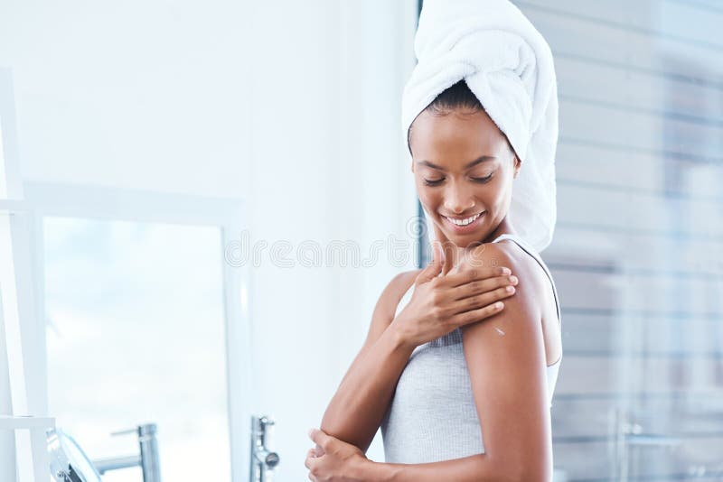 Take Care Of The Skin Youre In A Young Woman Applying Moisturizer To