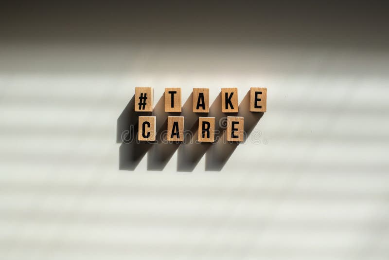 ` Take Care ` Text Made of Wooden Cube on White Background with Shadow ...
