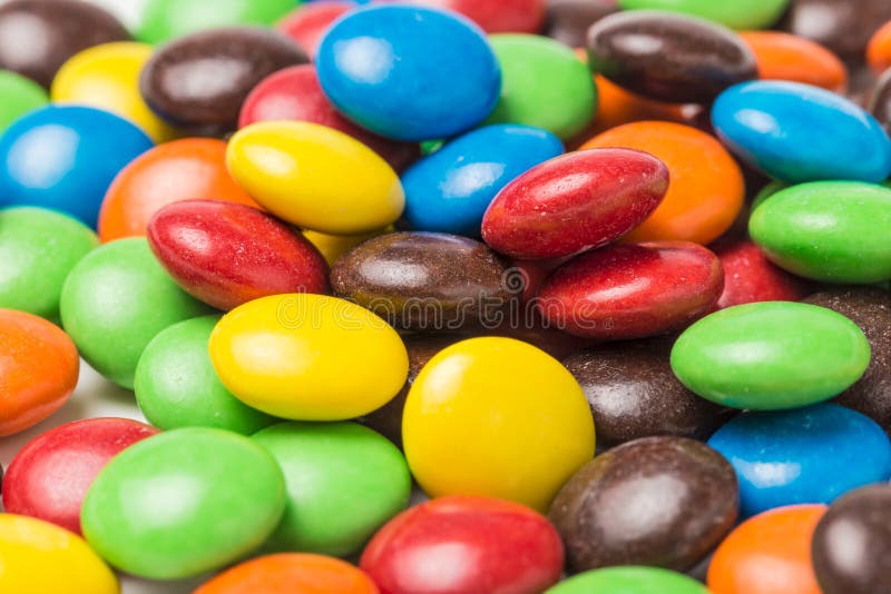 Colorful chocolate beans stock photo. Image of green - 140393498