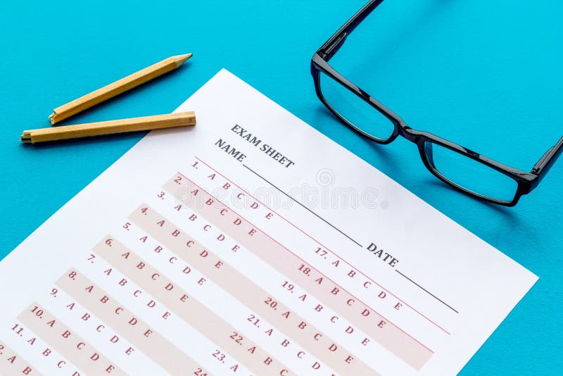 Take The Exam. Exam Sheet Near Glasses And Pencil On Blue Background ...