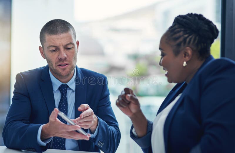 Take a Look. Two Businesspeople Meeting in the Boardroom. Stock Image ...