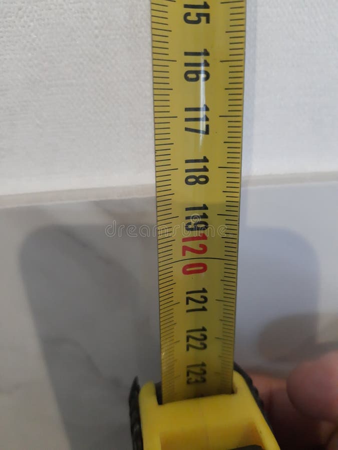 Take Measurements with a Yellow Tape Measure. Stock Photo - Image of ...