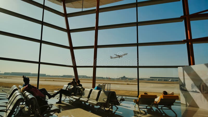 Take Off the Plane in the Windows of the Airport. Stock Photo - Image ...