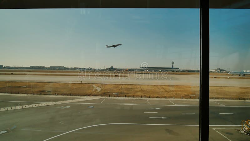 Take Off the Plane in the Windows of the Airport. Stock Footage - Video ...