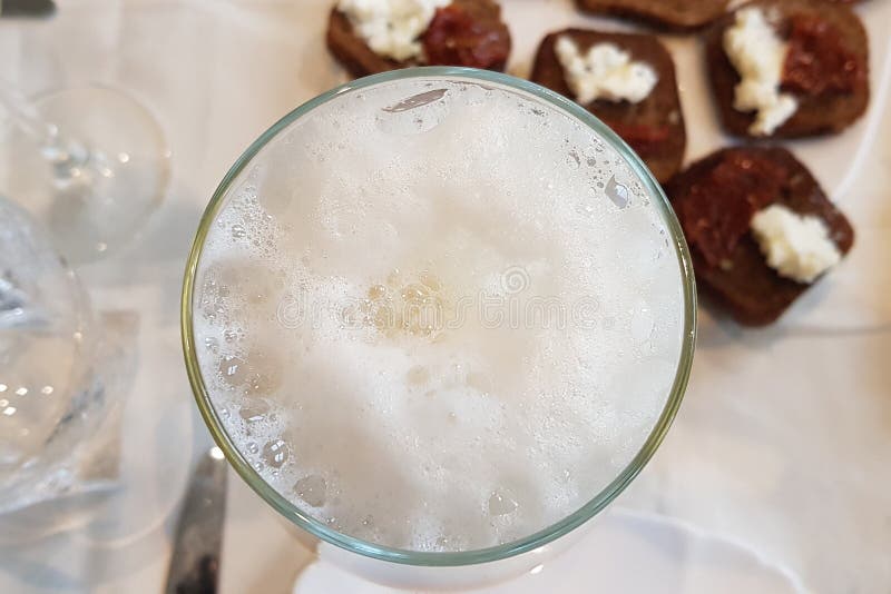 Take Off Shots of Beer Glass on the Table at the Restaurant Stock Photo ...