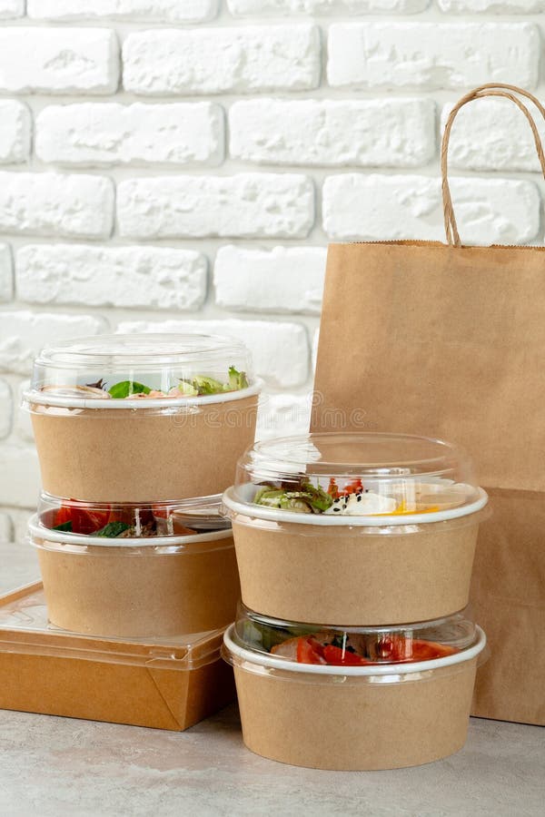 Take Out Food in Boxes and Craft Bag Against Brick Background Stock ...