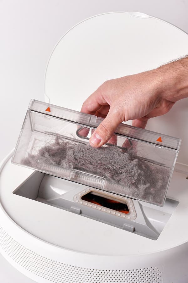 Take Out the Transparent Dust Container from the Robot Vacuum Cleaner ...