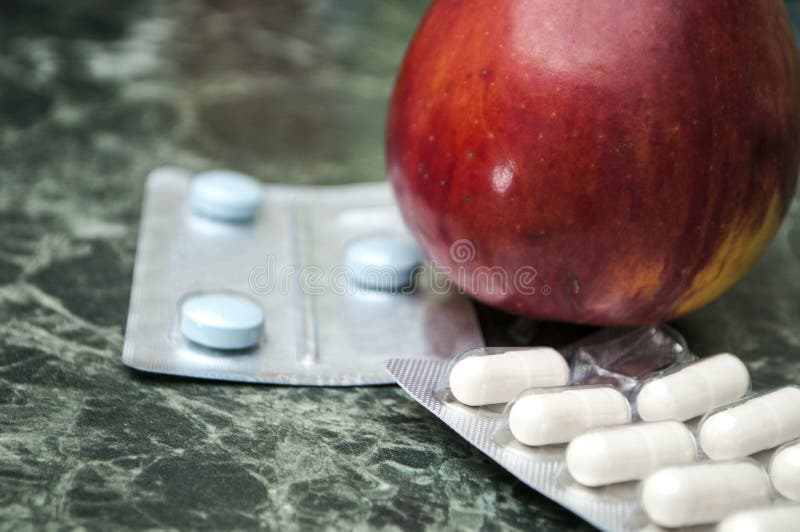 Pills and Healthy Red Apples Stock Photo - Image of medical, capsule ...