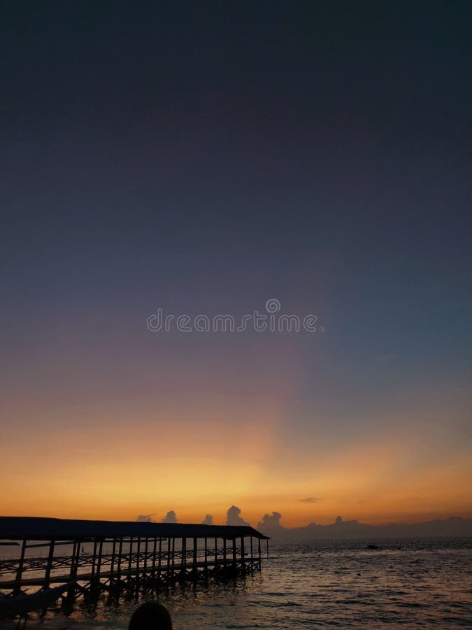 Take a rest at the beach stock photo. Image of sunset - 218197600