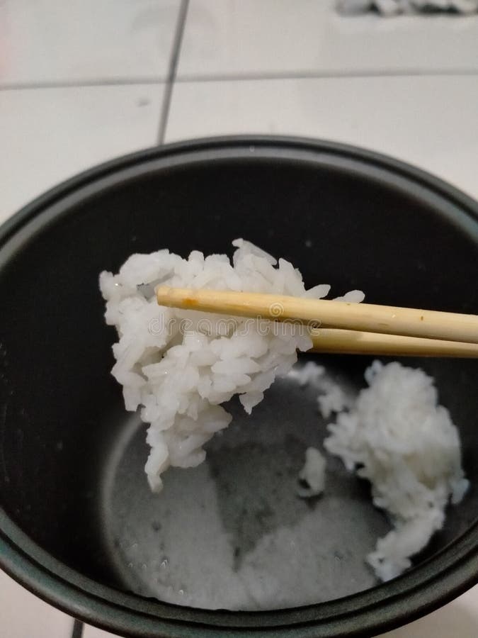 Take rice using chopsticks stock photo. Image of rice - 272391090