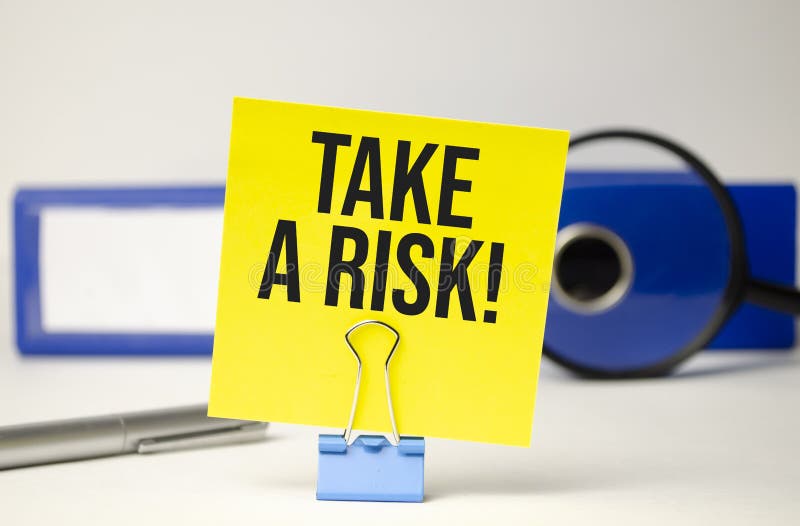 Take a Risk Text on Yellow Sticker and File Folder Stock Photo - Image ...