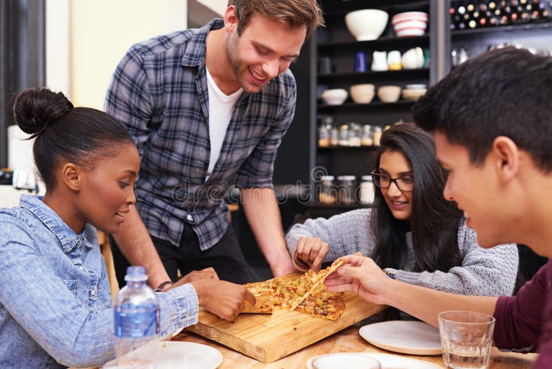 Take a Slice. a Group of Friends Enjoying Pizza Together. Stock Image ...