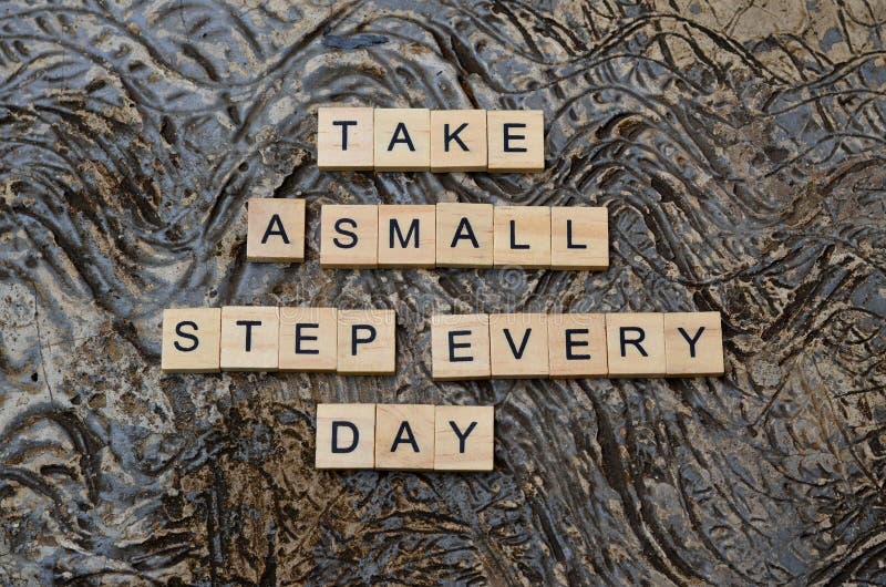 Take a Small Step Every Day Text on Wooden Square. Stock Image - Image ...