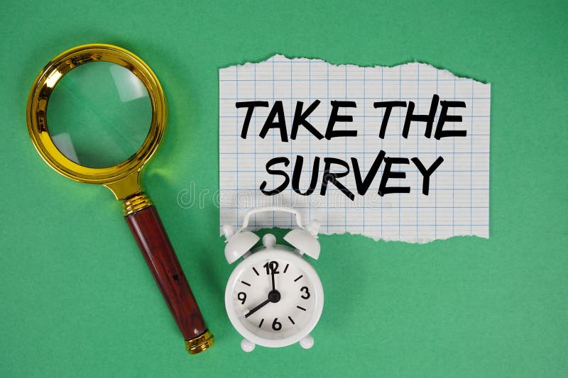 Take the Survey Text Written on Paper with Magnifying Glass and Alarm ...
