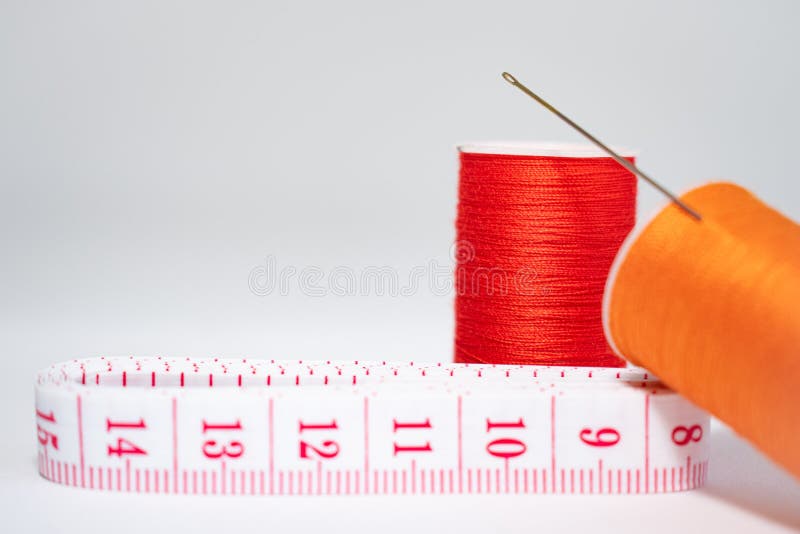 Take about Two Spools of Orange Thread of Different Shades Stock Image ...