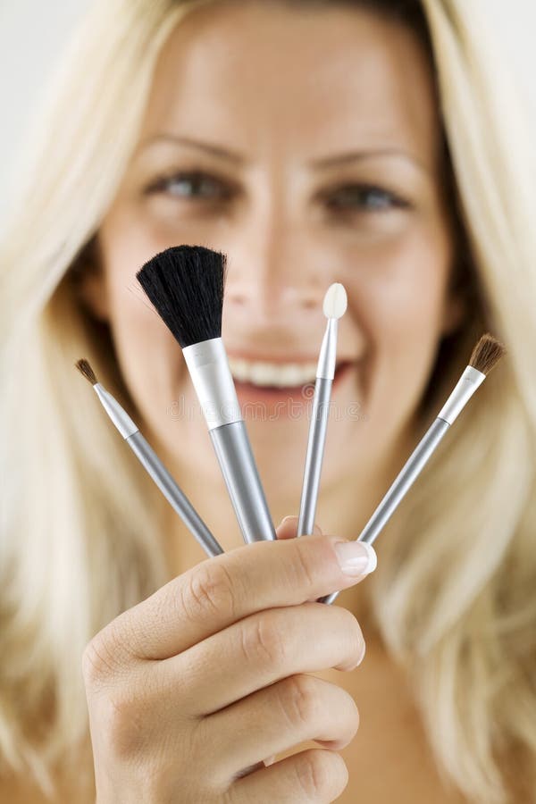 Take your pick stock photo. Image of makeup, holding, woman - 4132616