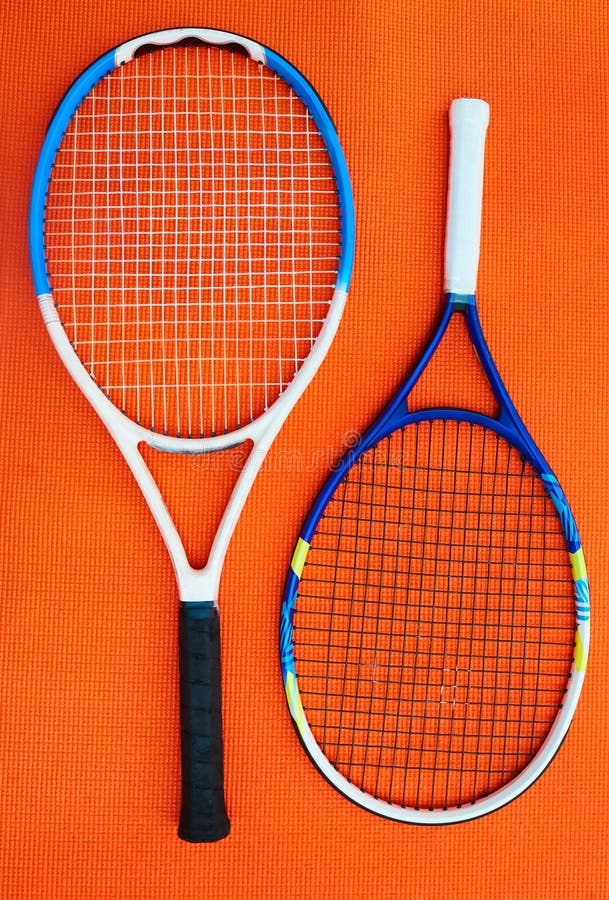 Take Your Pick. High Angle Shot of Two Tennis Rackets Placed on an ...