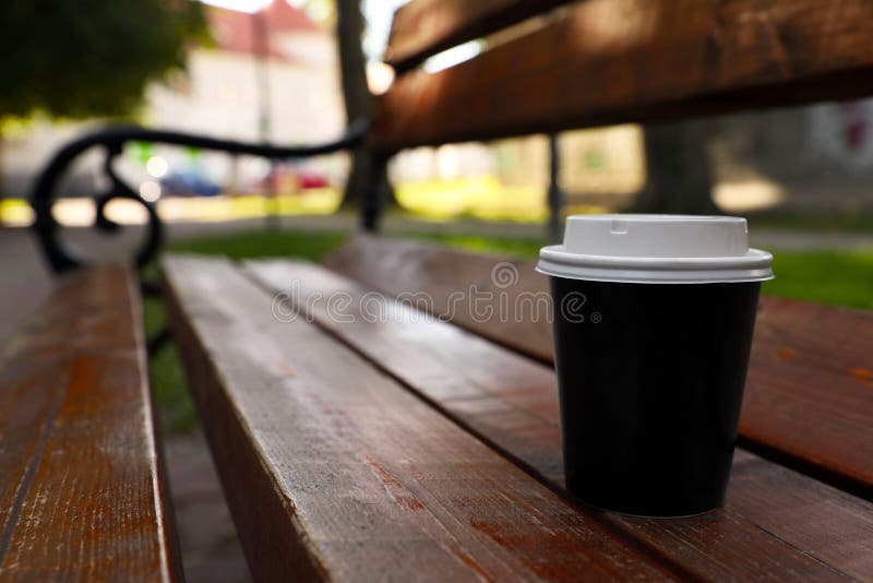 Takeaway Paper Cup with Plastic Lid on Wooden Bench Outdoors, Space for ...