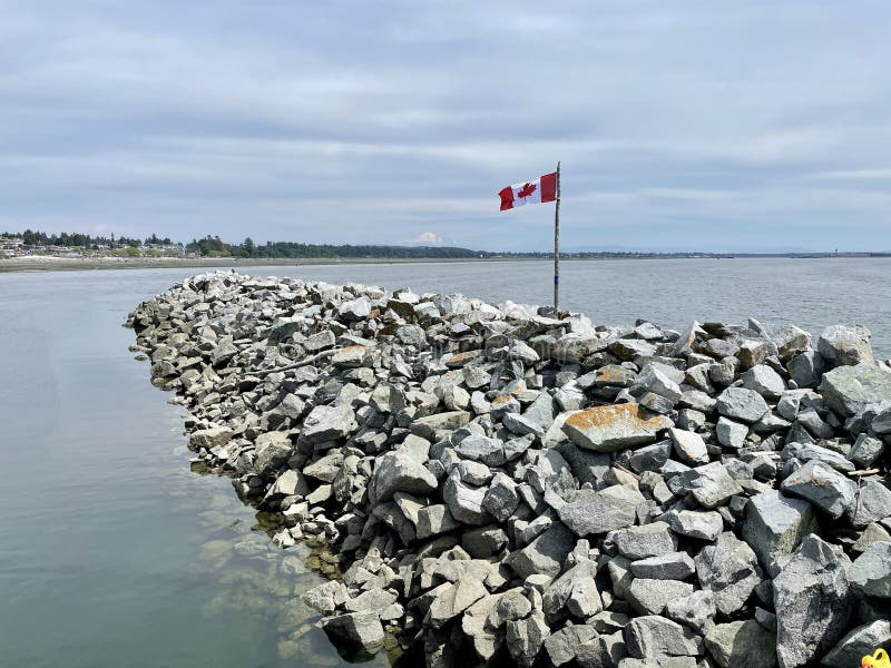 White Rock Canada Flag stock image. Image of coast, terrain - 254194935