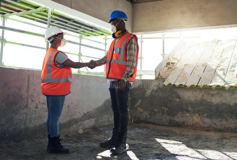It Takes Trust To Build a Strong Connection. Two Builders Shaking Hands ...