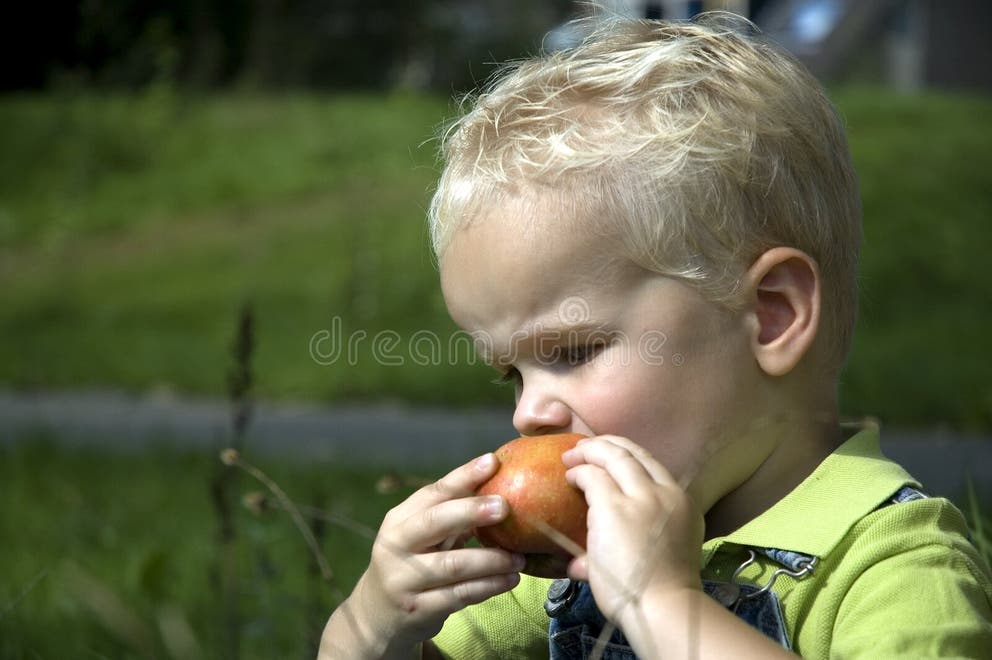 Taking a bite -2 stock image. Image of relaxed, biting - 1379255