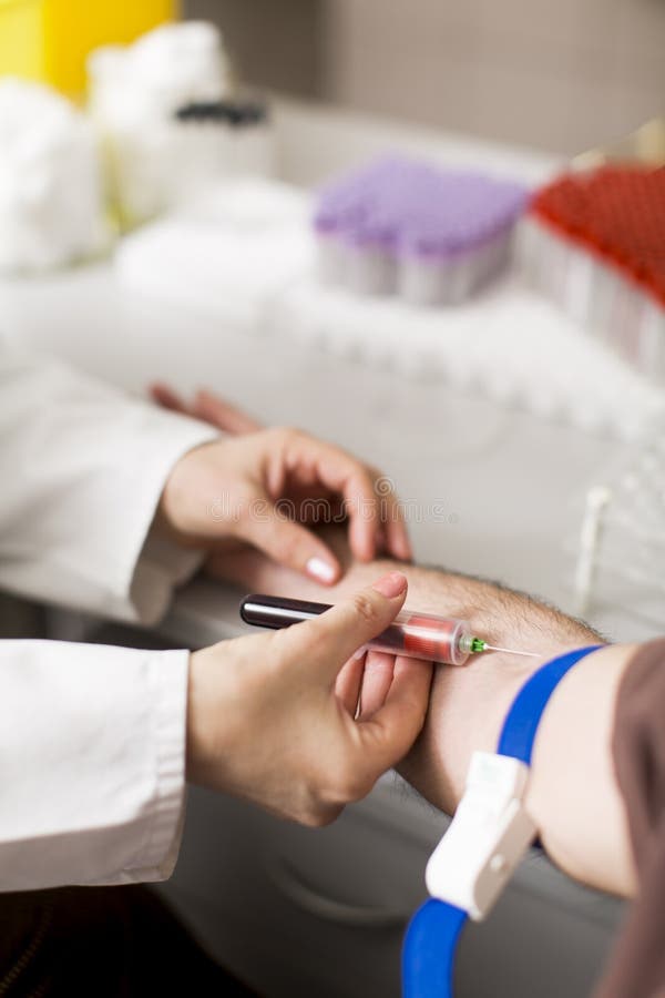 Taking blood in laboratory stock photo. Image of sample - 59156006