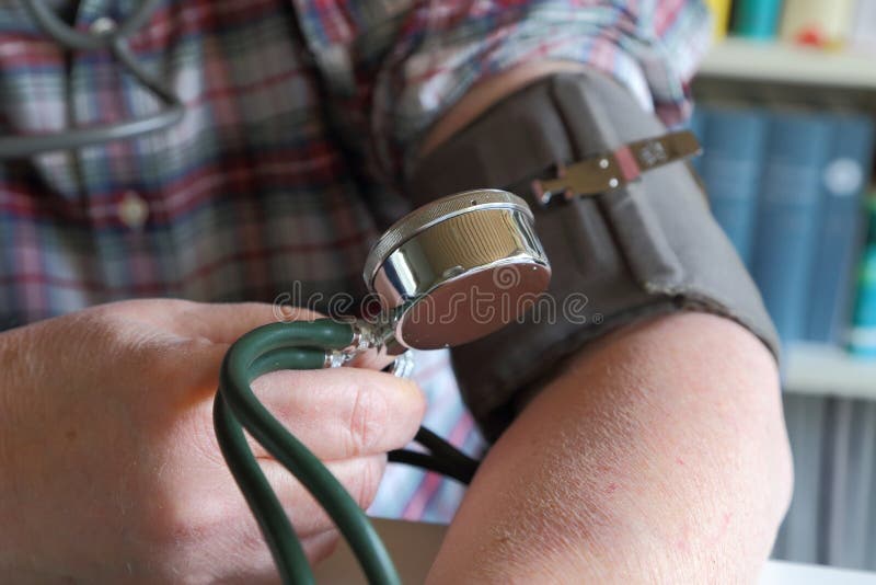 Taking blood pressure stock image. Image of vein, close - 39790309