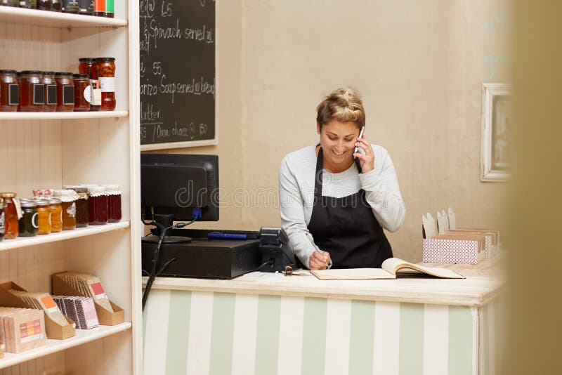 Taking Bookings for the Next Day Stock Photo - Image of entrepreneur ...