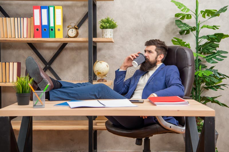 Taking a Break from Routine. Businessman Drink Coffee in Office Stock ...